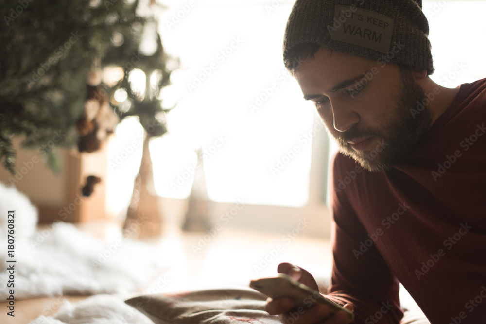 Man using a vaper and smartphone Stock Photo | Adobe Stock