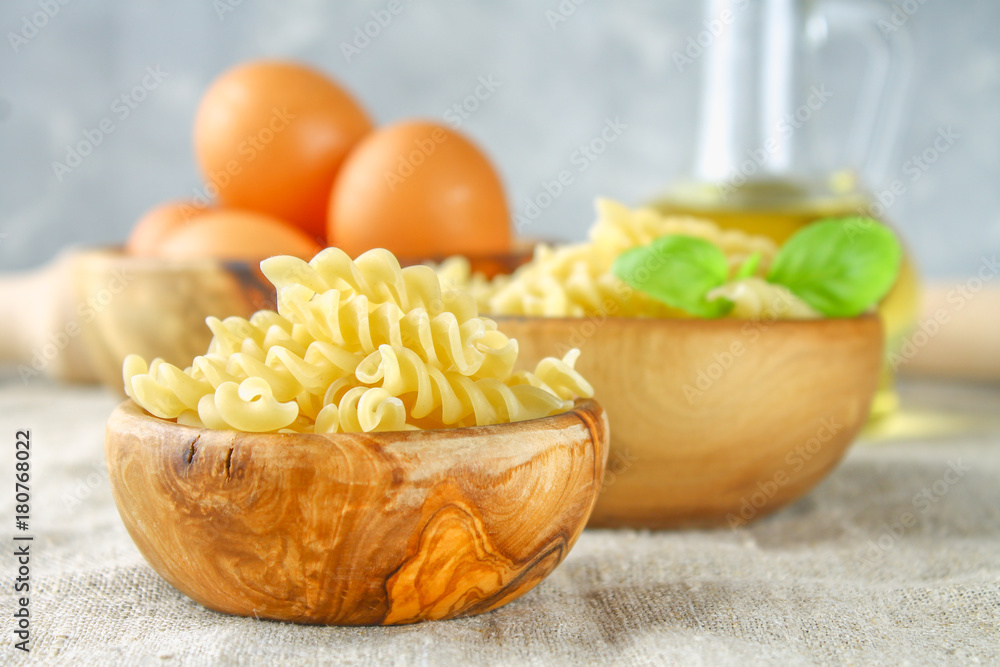 Helix- or corkscrew-shaped pasta. Rotini macaroni. Related to fusilli ...