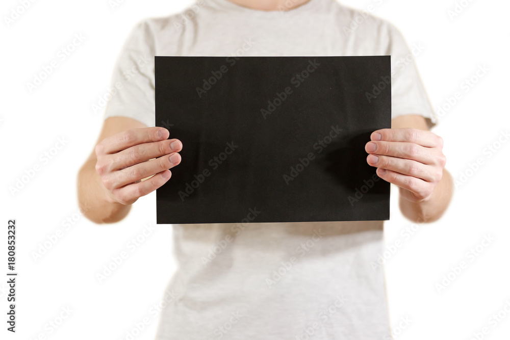 Man holding black A4 paper horizontally. Leaflet presentation. Pamphlet ...