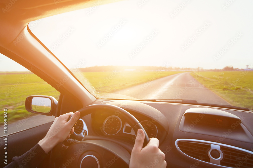 driving car, hands of driver on steering wheel, travel background Stock ...
