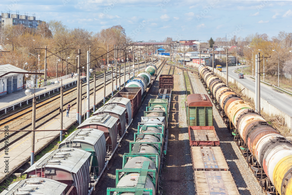 Four freight trains at the station Stock Photo | Adobe Stock