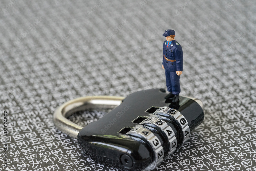 Computer security or hacker protection concept, with miniature figure ...