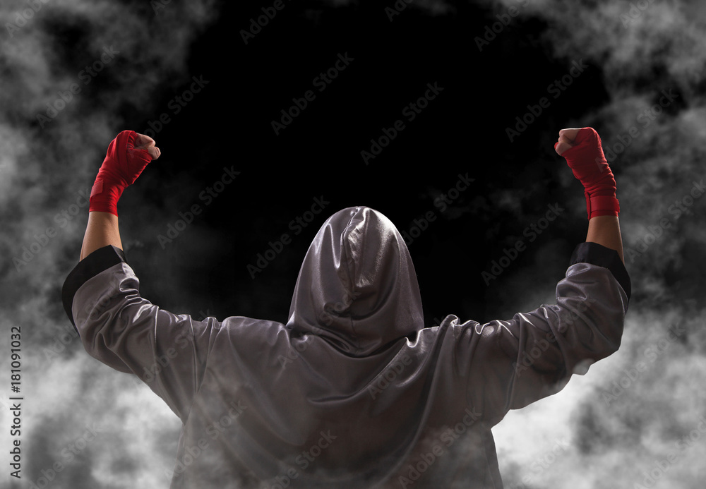 Female boxer with red boxing wraps wins the fight and bacame a champion ...