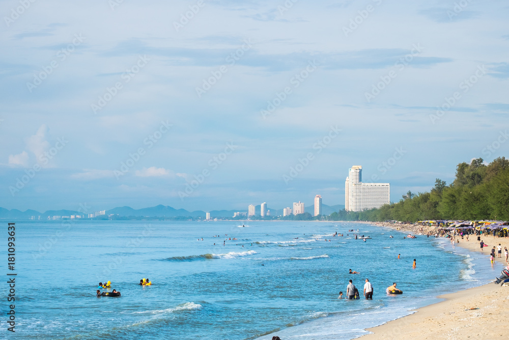 View of Cha am beach and building resort many people walking and ...