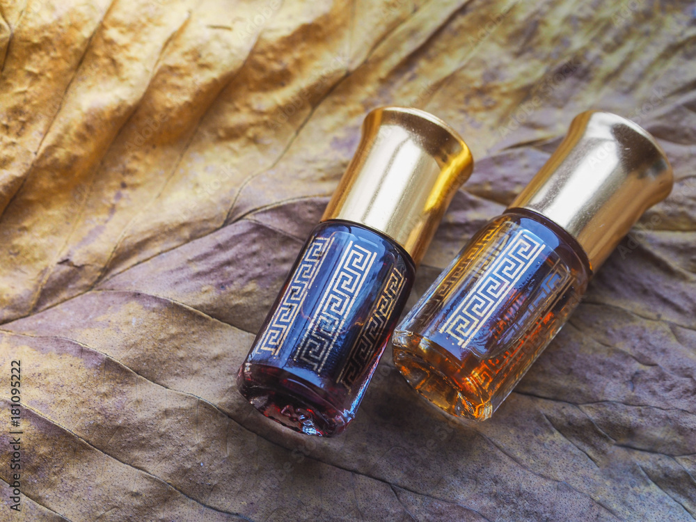 Arabian oud attar perfume or agarwood oil fragrances in mini bottle ...