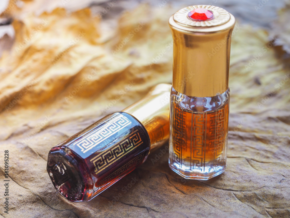 Arabian oud attar perfume or agarwood oil fragrances in mini bottle ...