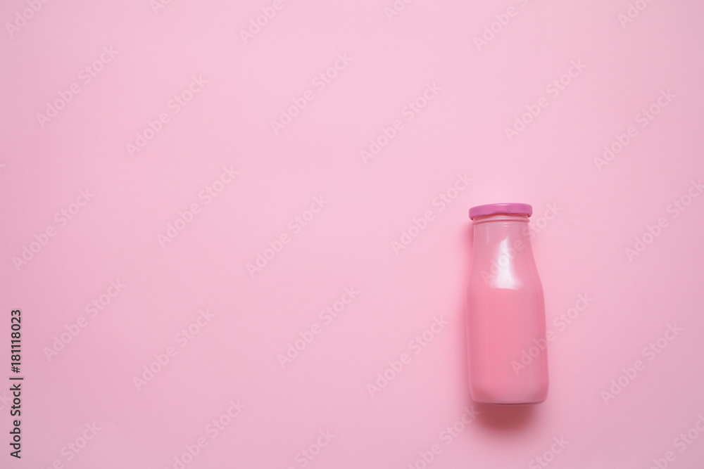 pink glass bottle on pastel pink paper background Stock Photo | Adobe Stock