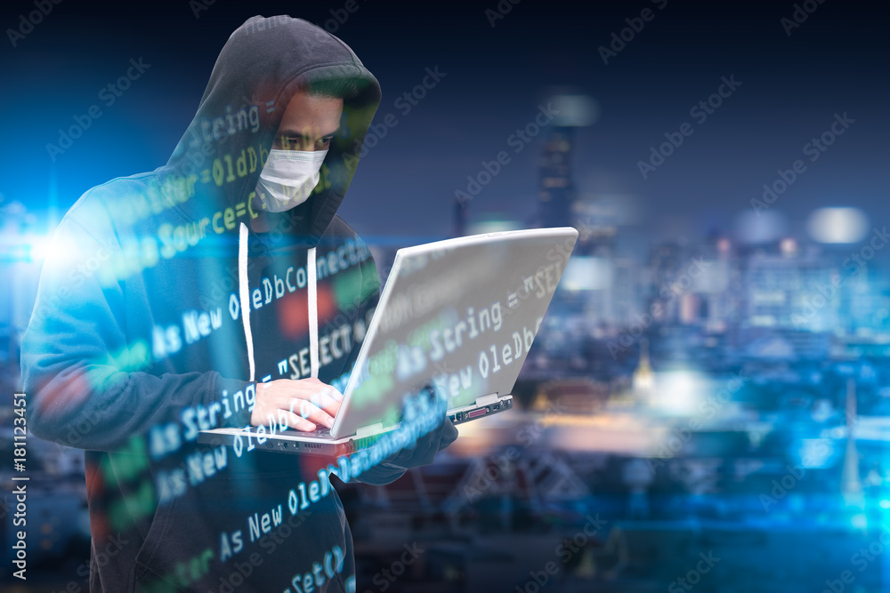 The double exposure image of hacker hold a laptop overlay with source ...