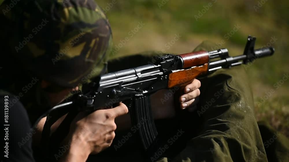 Outdoor shooting with automatic rifle in a shooting range Stock Video ...