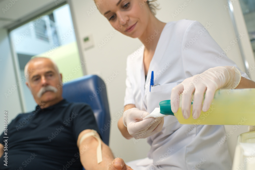 female nurse or doctor preparing an injection Stock Photo | Adobe Stock