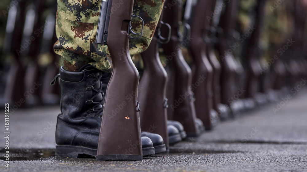 Soldiers stand in row. Gun in hand. Army, Military Boots lines of ...
