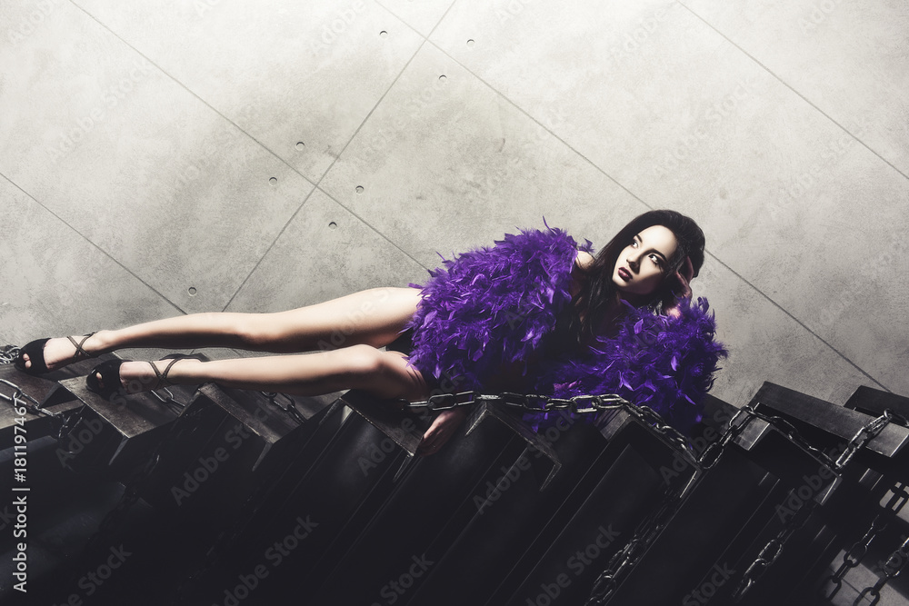 beautiful model posing in the Studio, stairs, chains Stock Photo ...