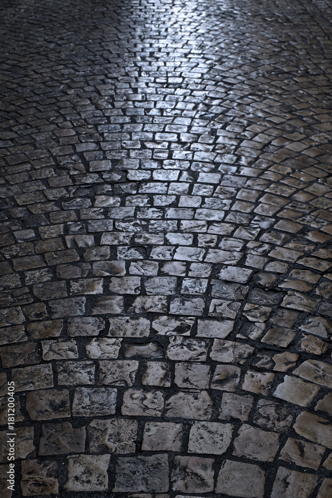 old cobblestone street at night dark stone texture background vertical ...