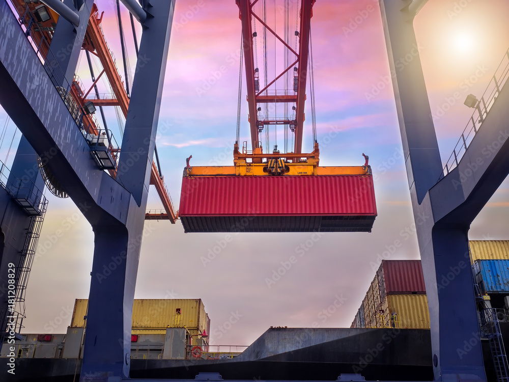Industrial port crane lift up loading export containers box onboard ...