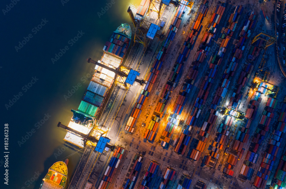 Containers yard in port congestion with ship vessels are loading and ...