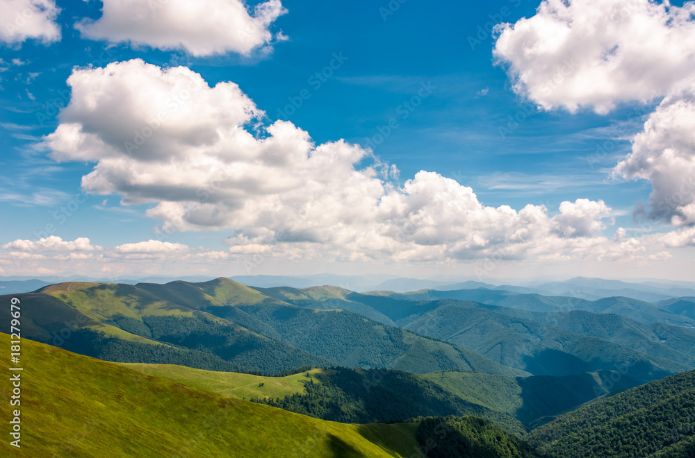 Carpathian mountain ridge with its spurs under sky with clouds ...