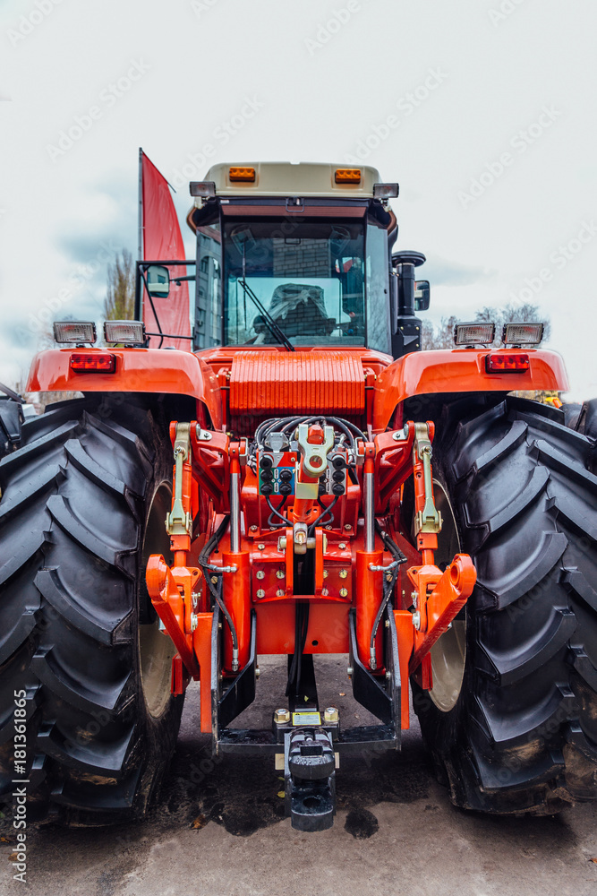Rear view of modern agricultural tractor. Hydraulic hitch. Hydraulic ...