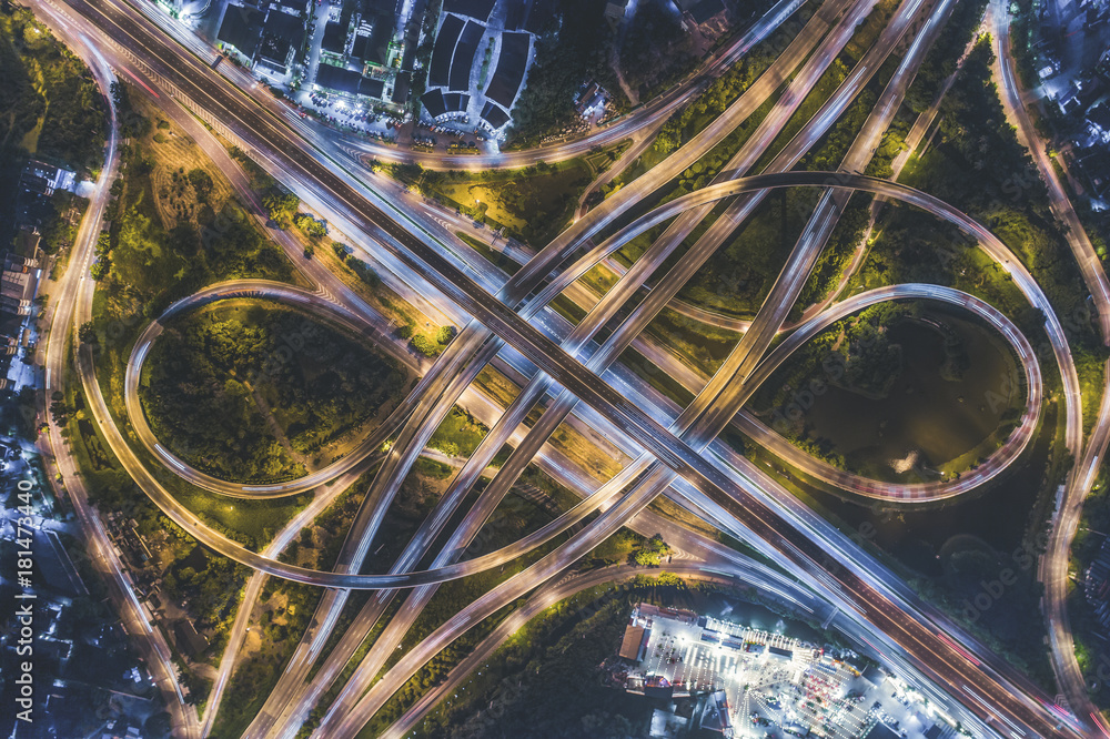Rush hour traffic on a city roads. Modern metropolis with intersection ...