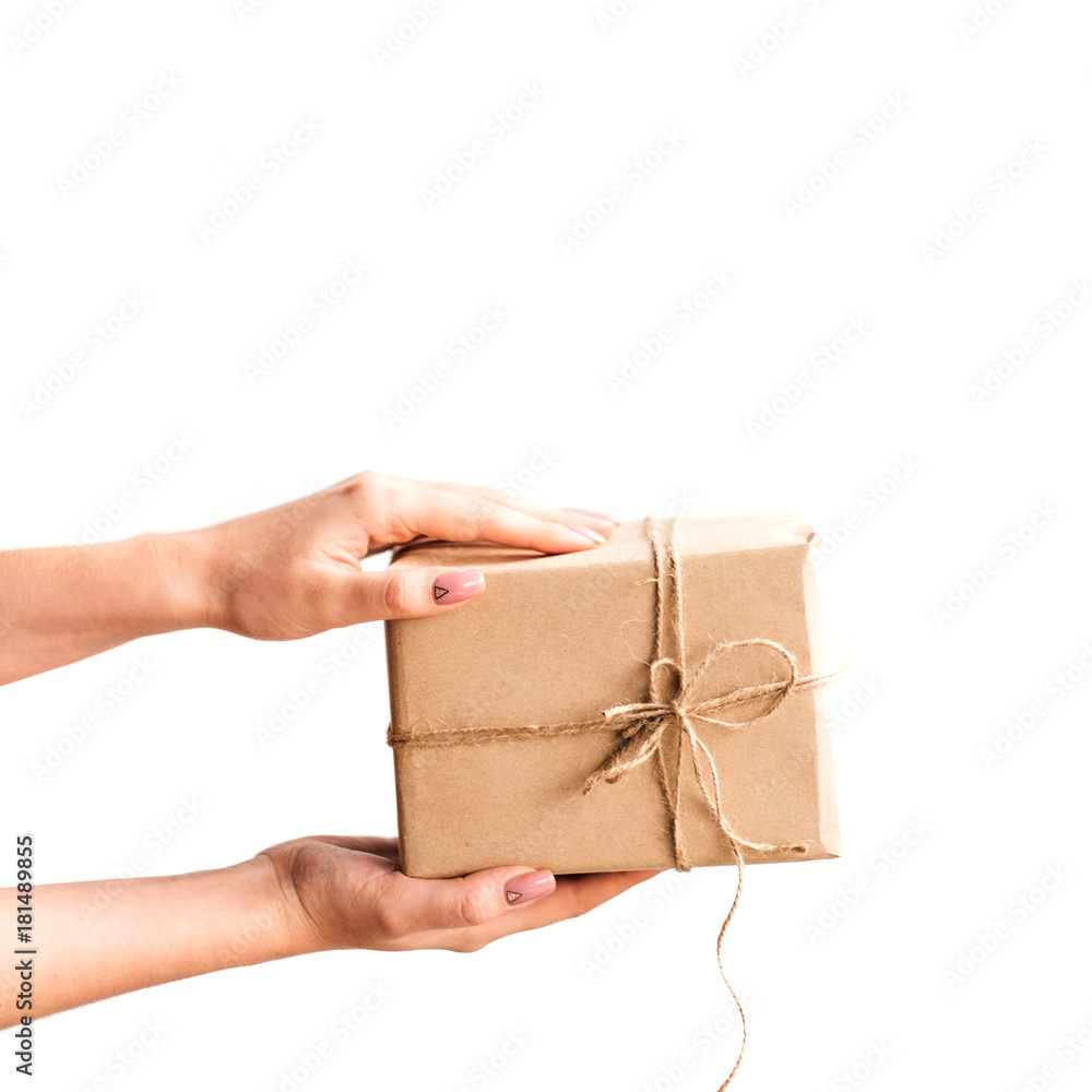 woman hands holding a wrapped box. Gift delivery concept Stock Photo ...