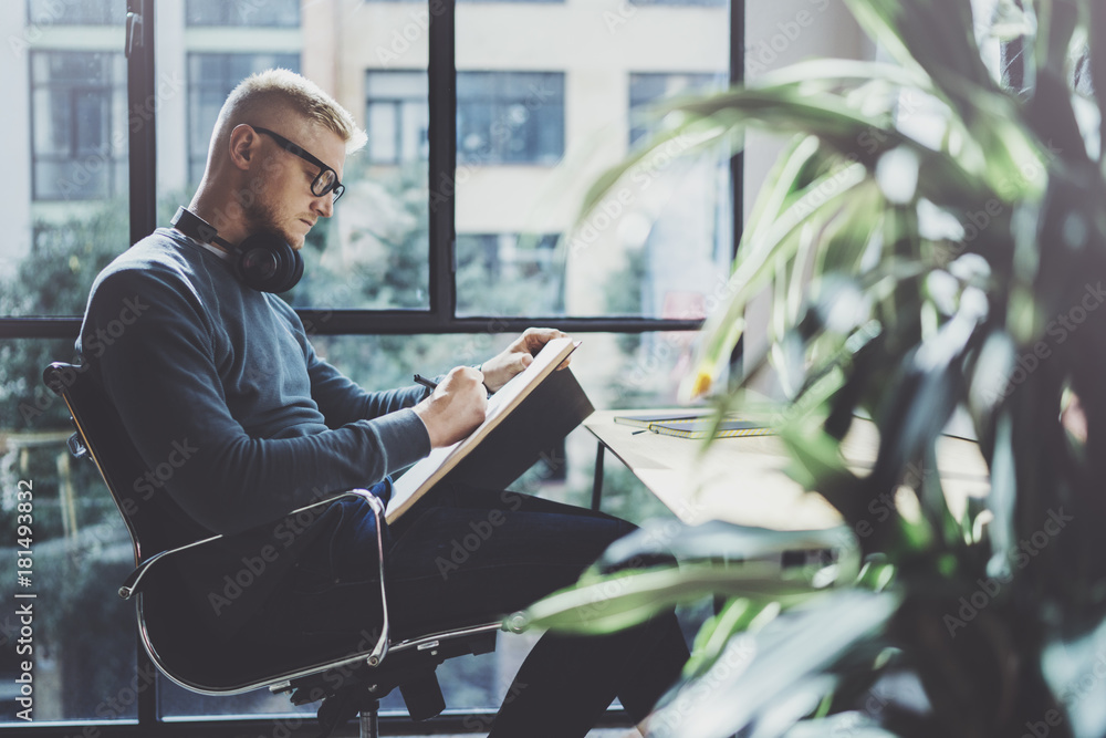 Skilled designer caucasian man drawing abstract sketch with pen.Art ...