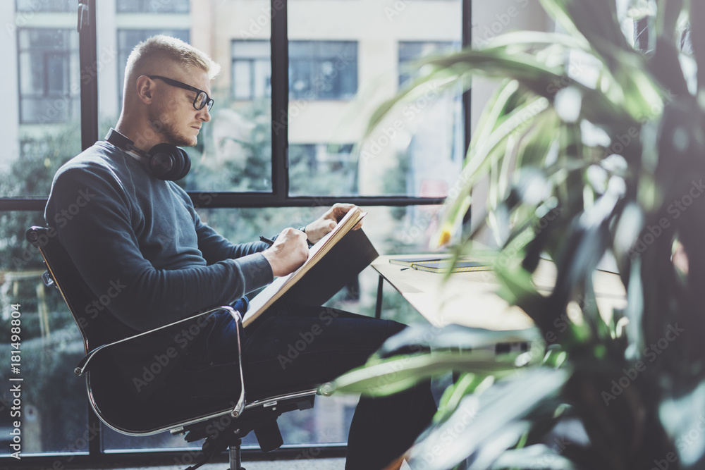 Skilled designer caucasian man drawing abstract sketch with pen.Art ...