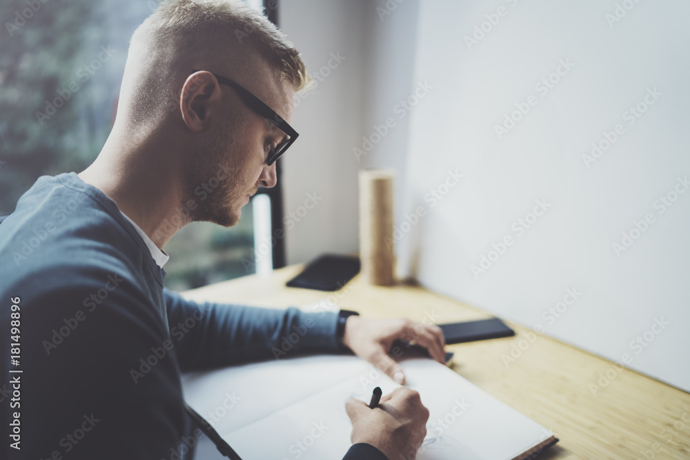 Skilled designer caucasian man drawing abstract sketch with pen.Art ...