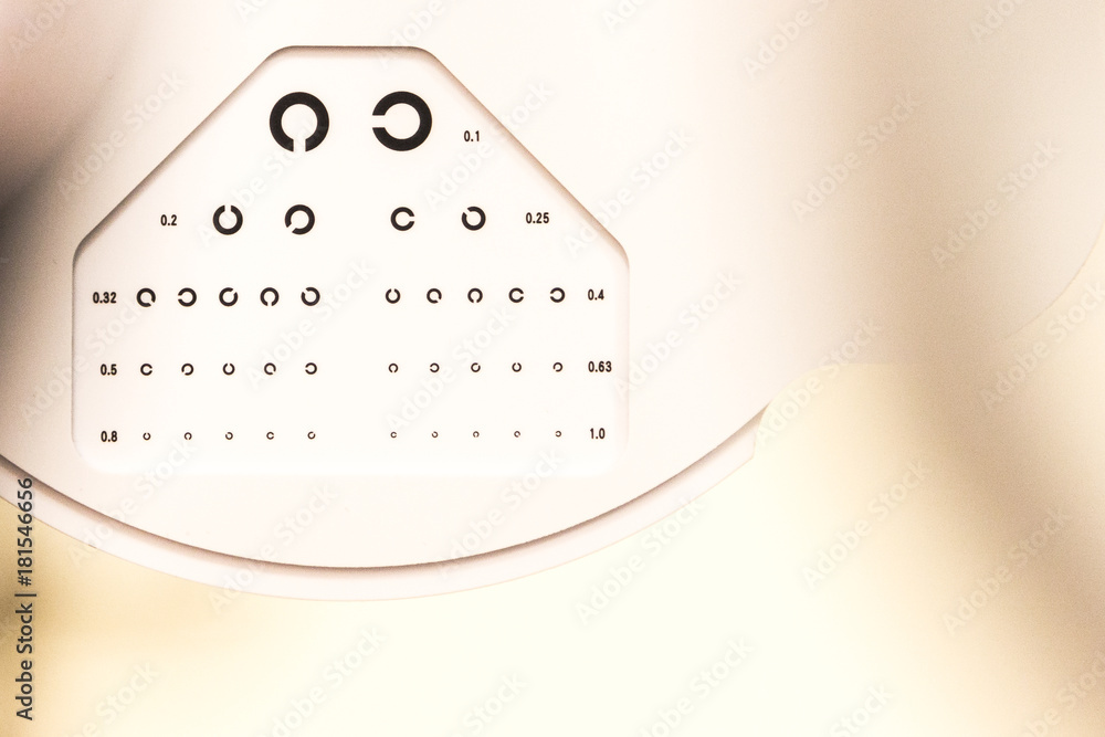 the cabinet of the eye doctor. eye sight test called landolt C Stock ...