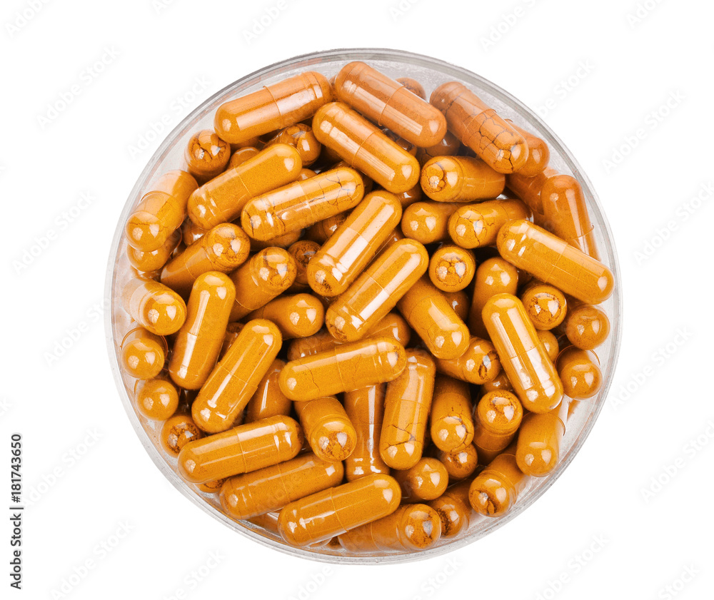 top view, turmeric capsules in plastic cup isolated on white background ...