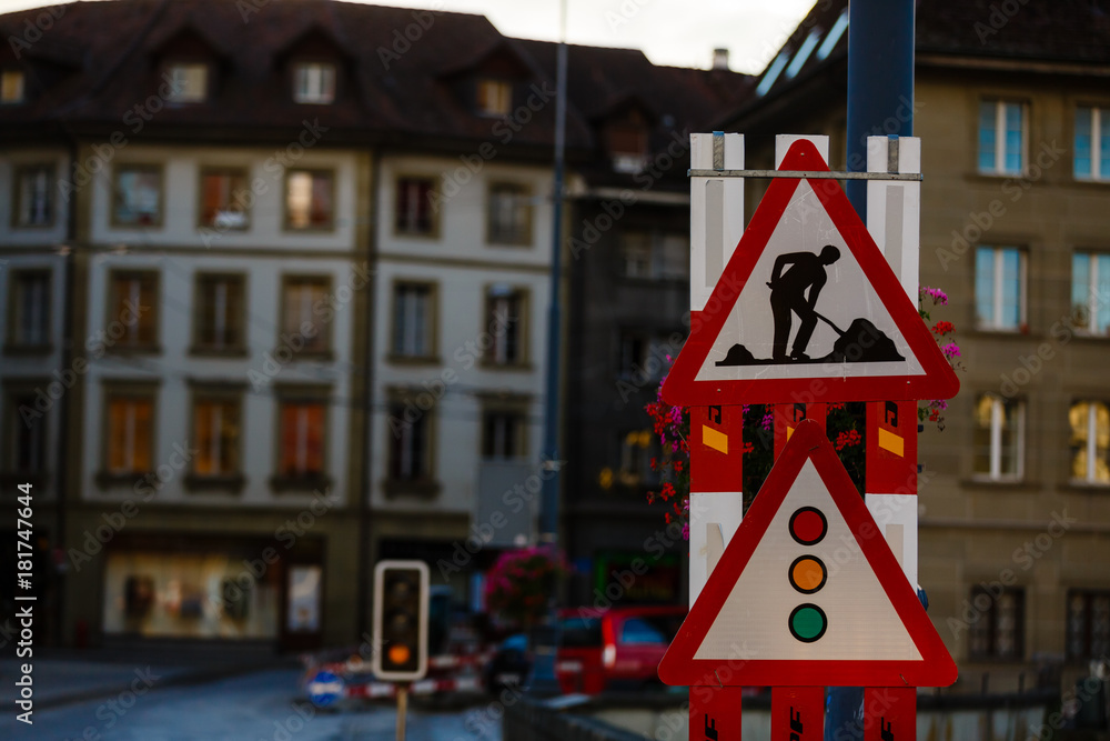Road signs on the roadside along the road warning about the repair ...