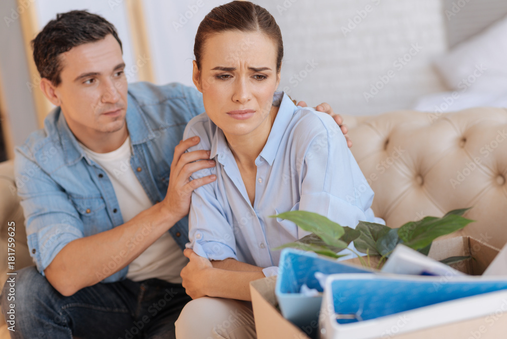 Little help. Emotional exhausted fired woman turning from her kind ...