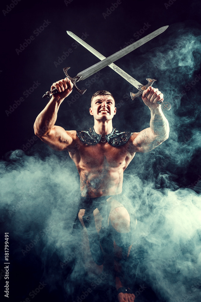 Aggressive expressive warrior crossing swords above head posing in ...
