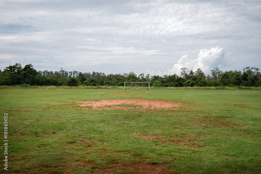 Abandoned football field with nobody and very bad grass, football field ...