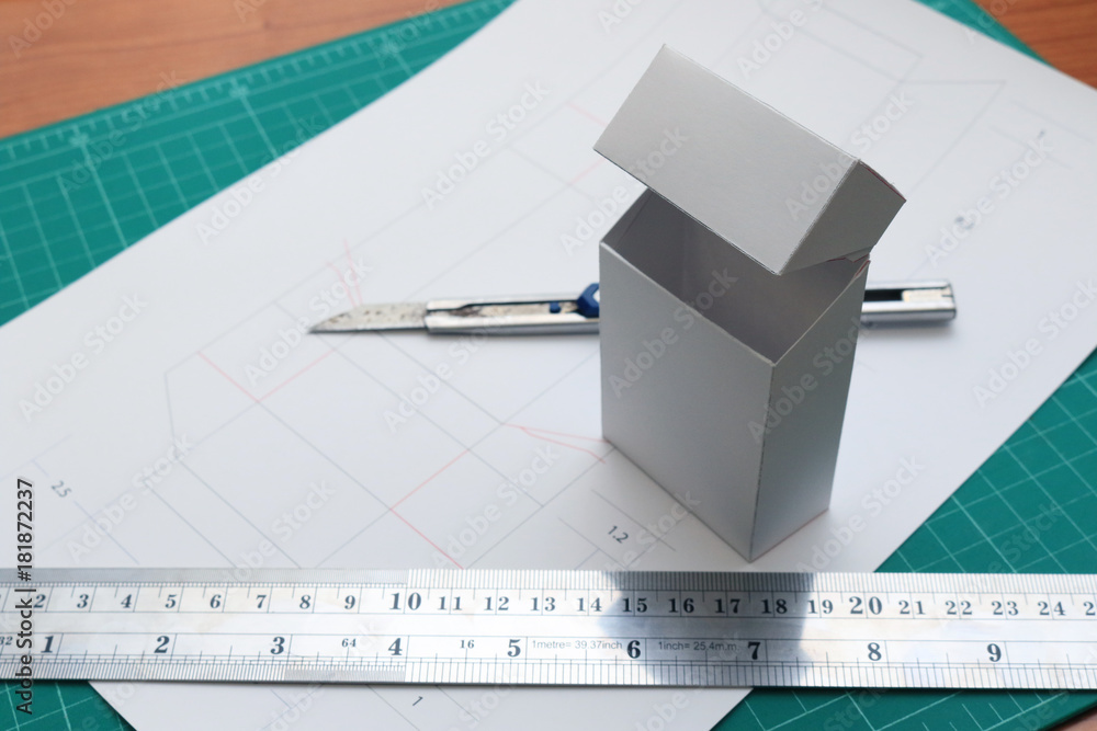 Packaging template box design post production with tools. Stock Photo ...