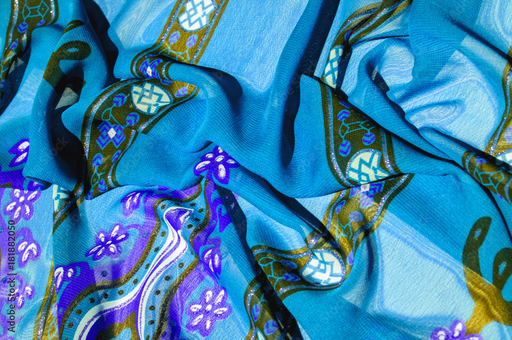 Background texture Blue silk fabric with a pattern. this light silk ...