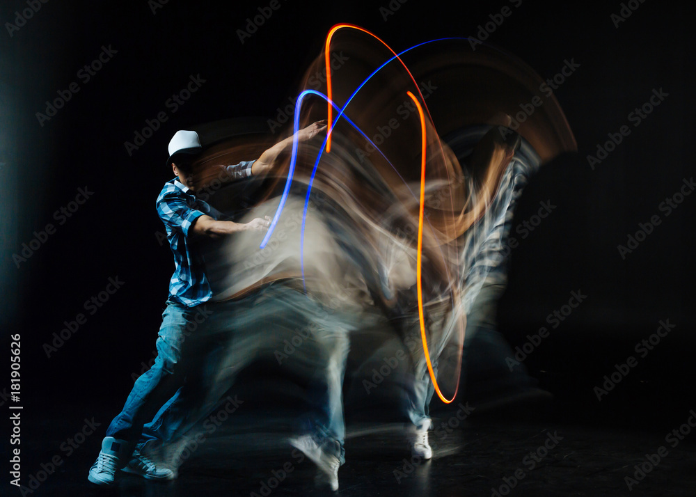 Dance is the movement. Pleasant nice young man standing against the ...