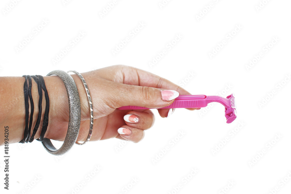 Woman hand holding pink razor on isolated white cutout background ...