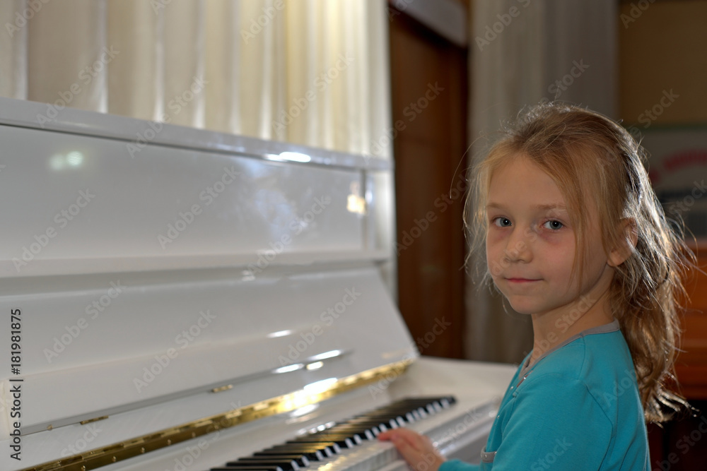 Hands on the white Keys of the Piano Playing a Melody. Women's Hands on ...
