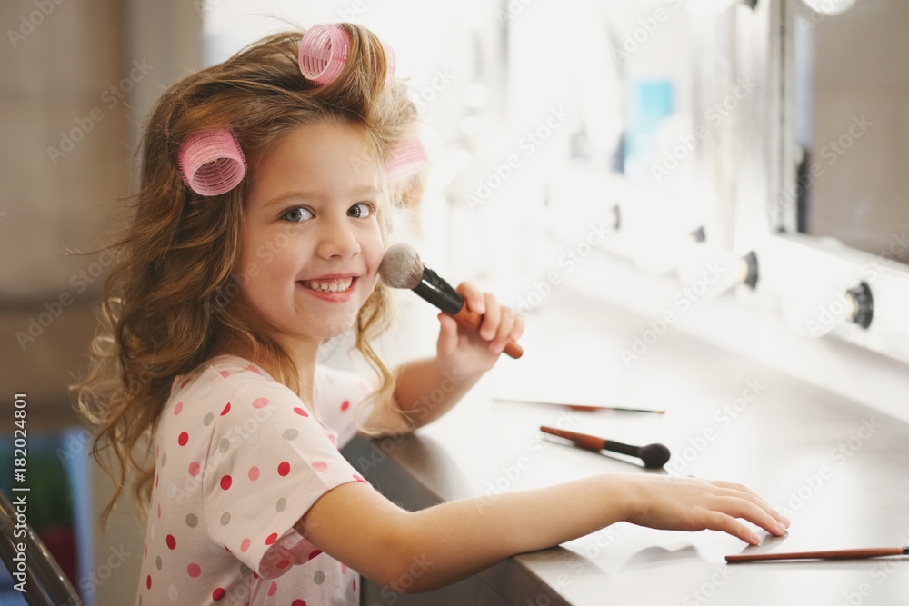 cute little girl making make-up Stock Photo | Adobe Stock