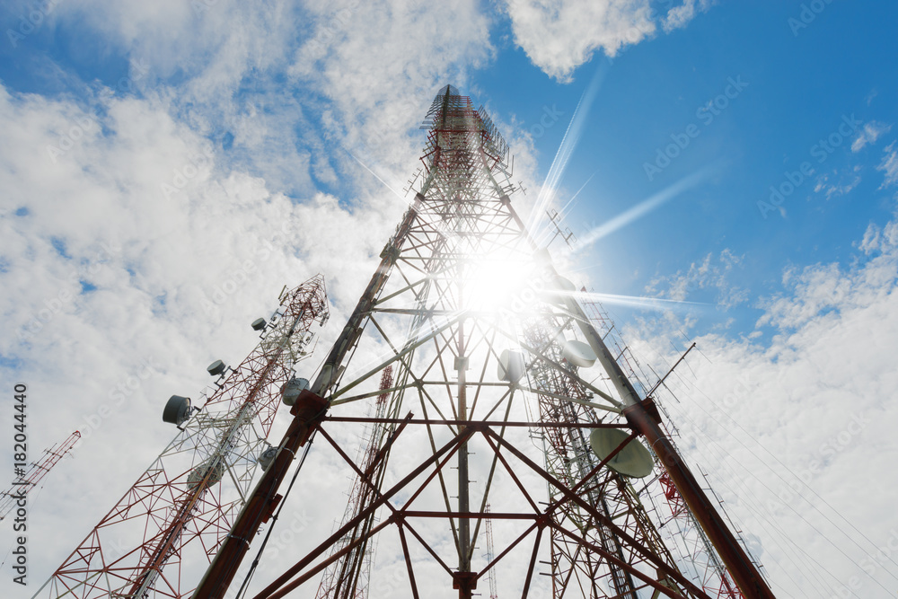 Antenna tower, low angle view.Telecommunication towers include of radio microwave and television ...