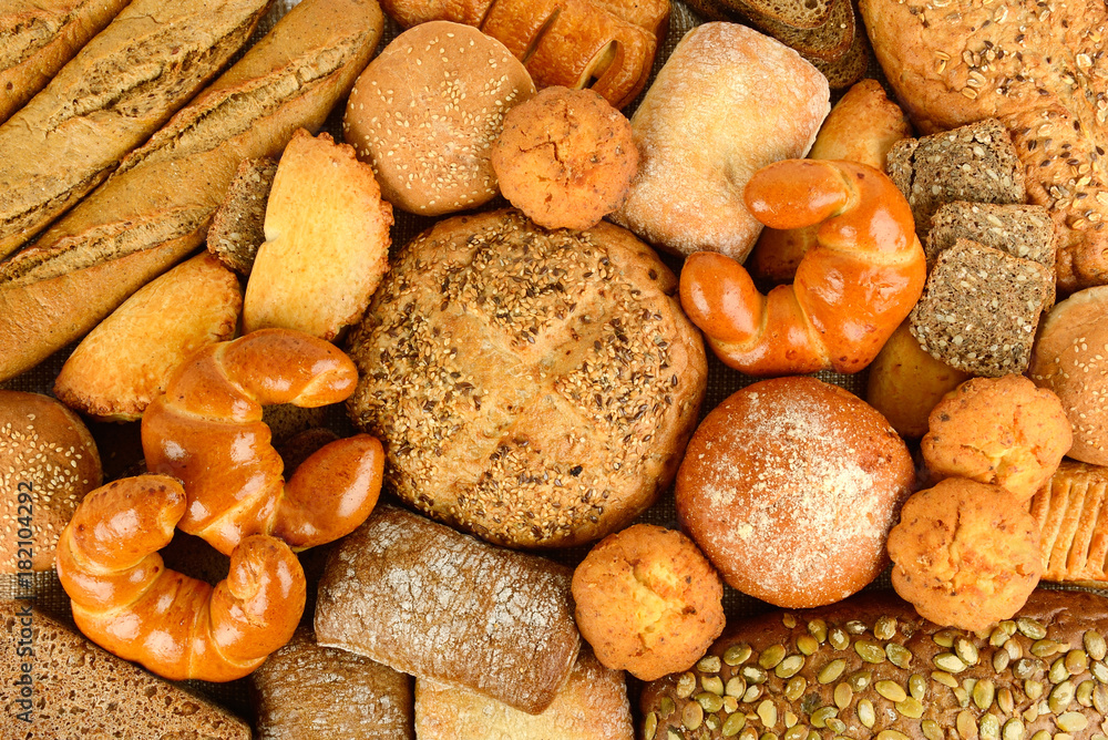 Collection of bread products (buns, baguettes, cereal bread, muffins ...
