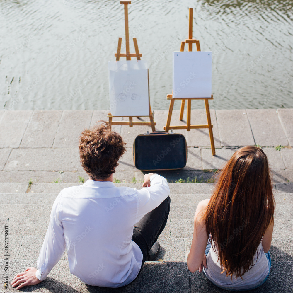 artists admire landscape. break from work. painters don't know how to ...