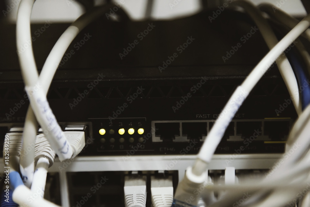 Foto de Fiber Optic cables connected to an optic ports and Network ...
