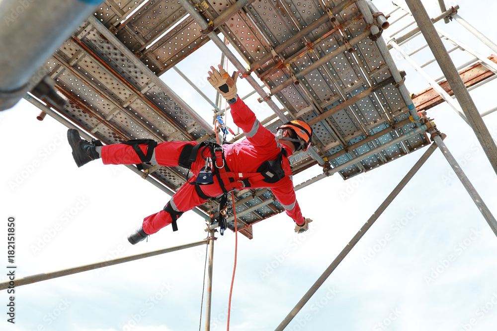 Work at height by rope access Stock Photo | Adobe Stock