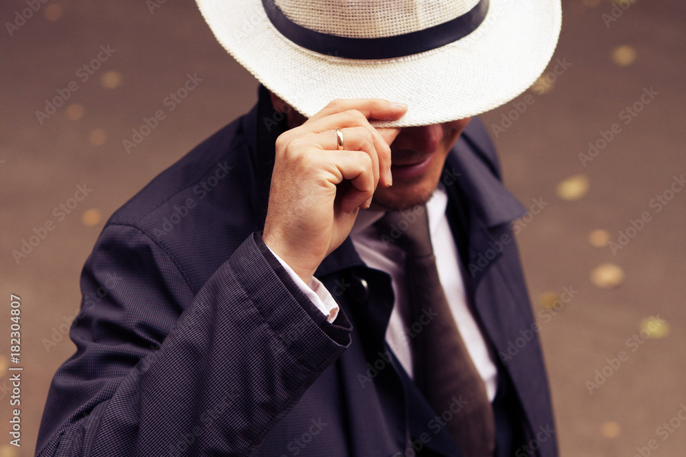 Confident middle-aged wealthy man dressed in retro style suit with ...