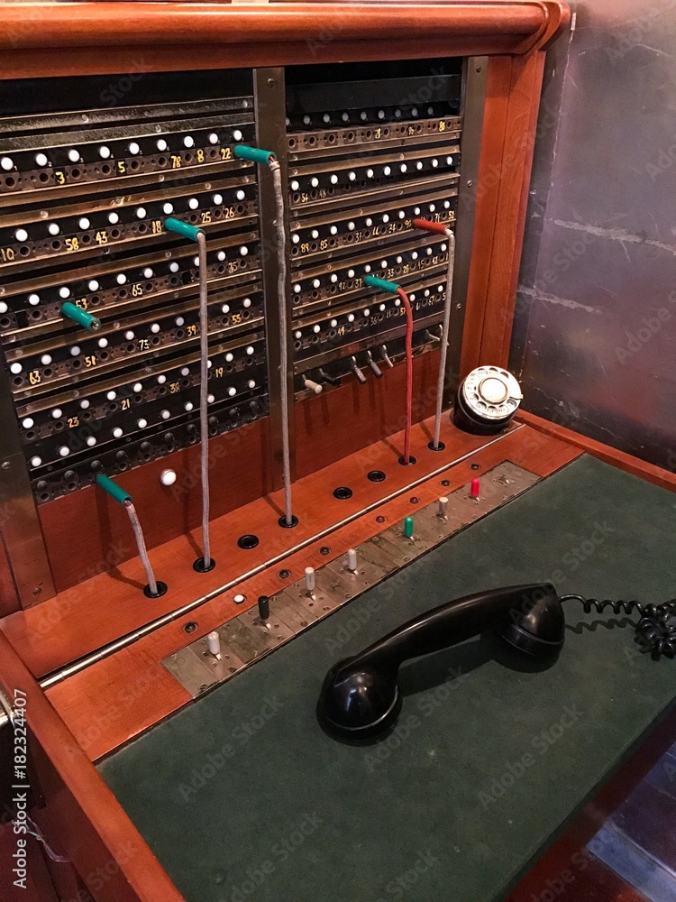 Vintage telephone switchboard and rotary phone Stock Photo | Adobe Stock