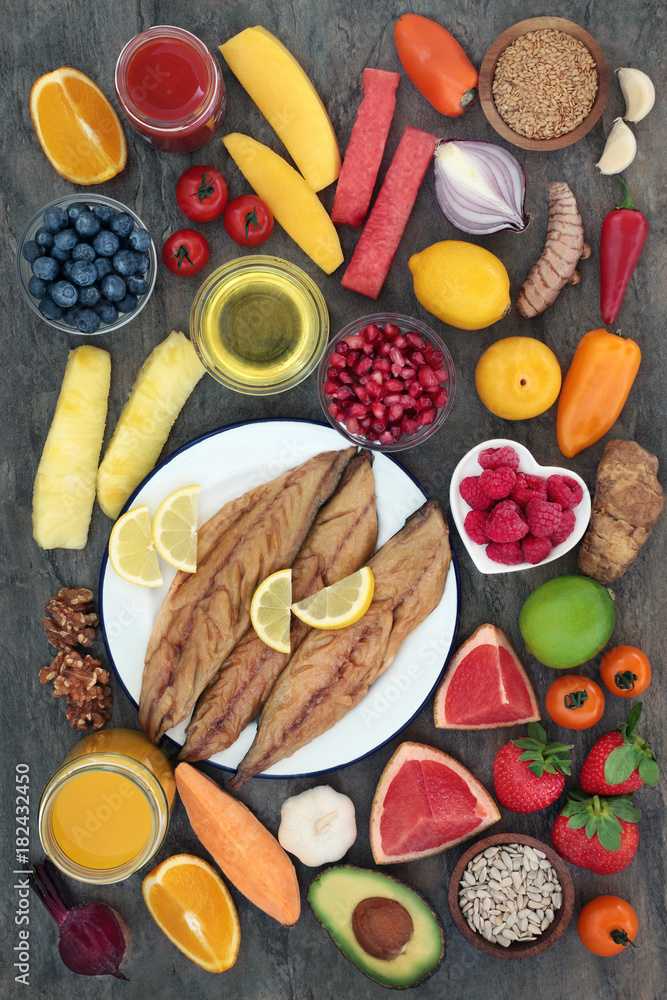 Super food for a healthy heart concept with smoked mackerel, fruit ...