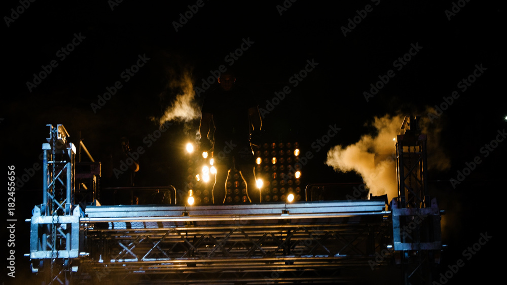 Fight night, profesional athletes.Fighter enters the ring. Lighting ...