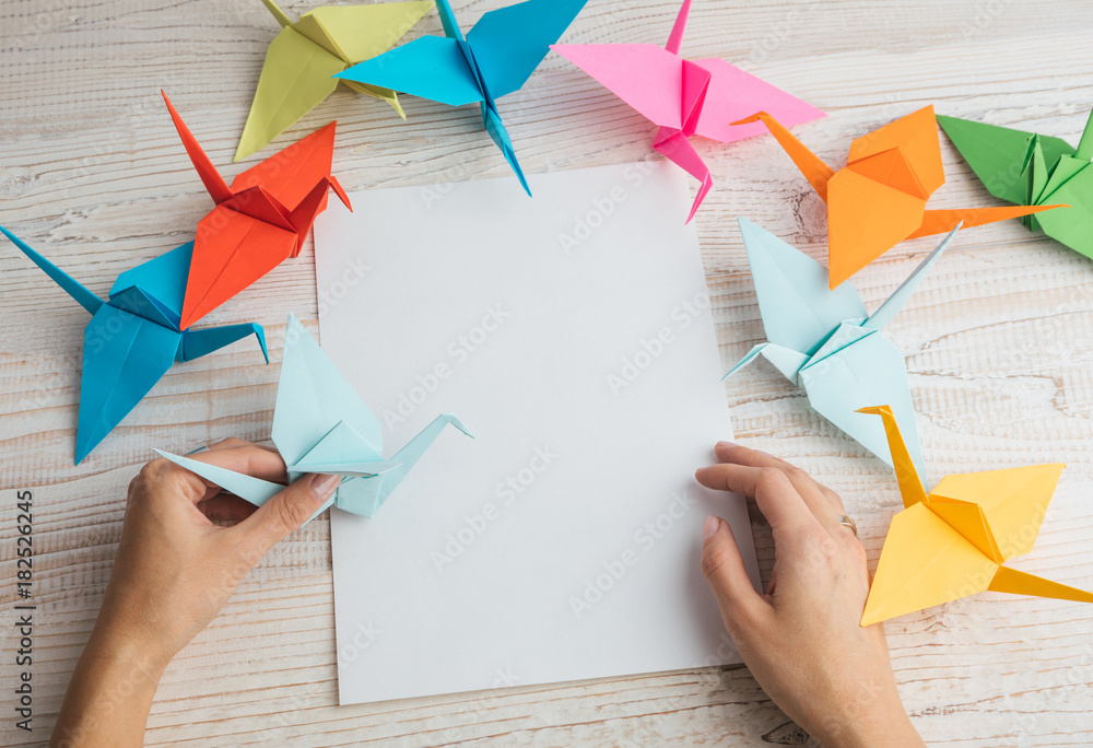 Japanese origami art of folding paper figures. Empty white paper for ...