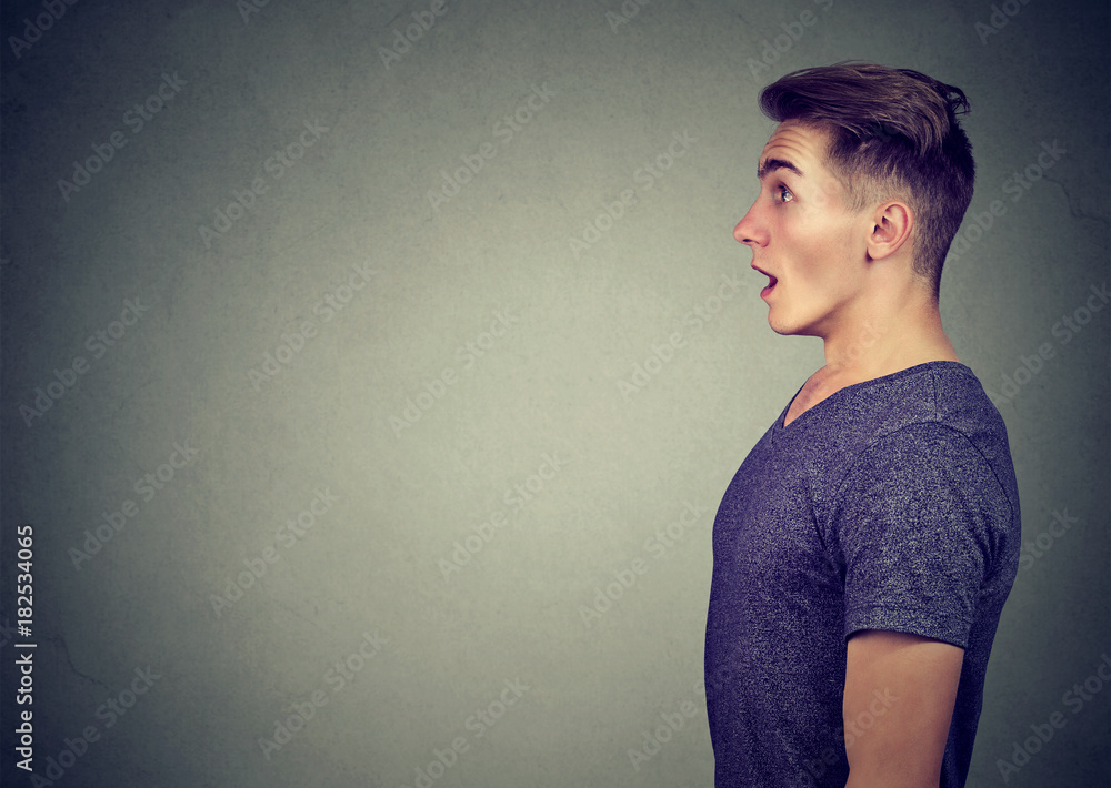 Side profile of a shocked man Stock Photo | Adobe Stock