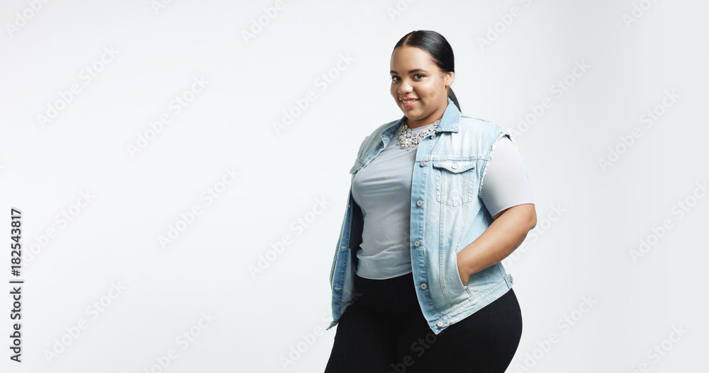 Plus size model in studio shoot happy smiling Stock Photo | Adobe Stock